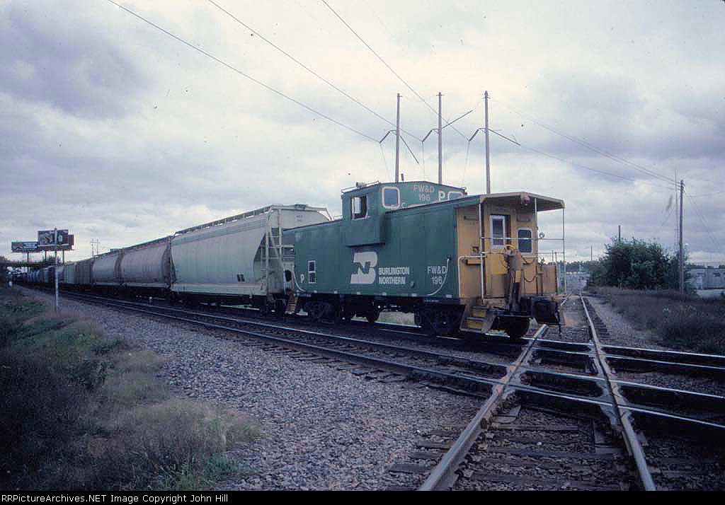 1381-26 Eastbound BN freight crossing Park Jct. diamond
